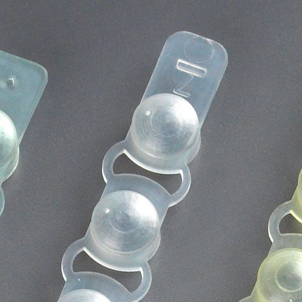 Cap strip for reaction strips — Empire Optics